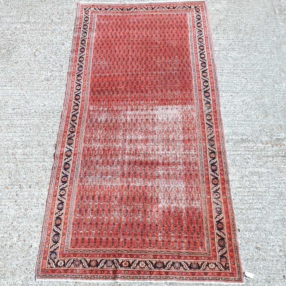 Lot 418 - An Eastern rug
