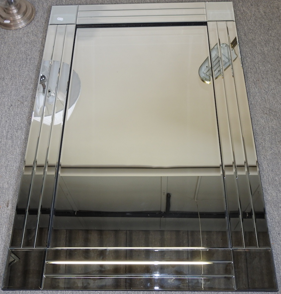Lot 677 - A modern sectional wall mirror