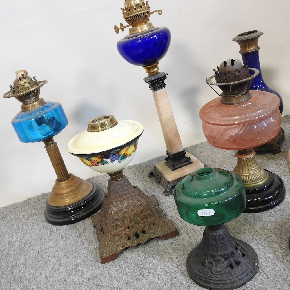 Lot 156 - A collection of oil lamp bases