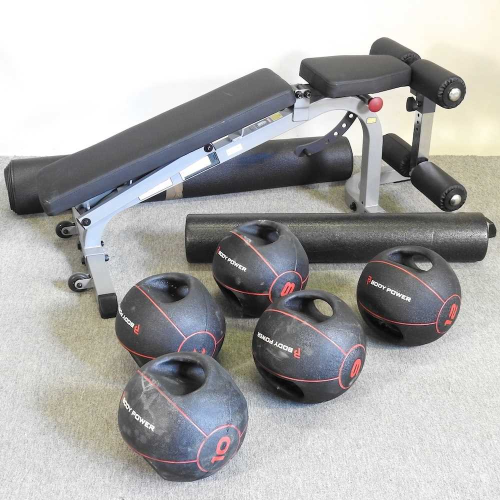 Lot 396 - A Body solid gym bench