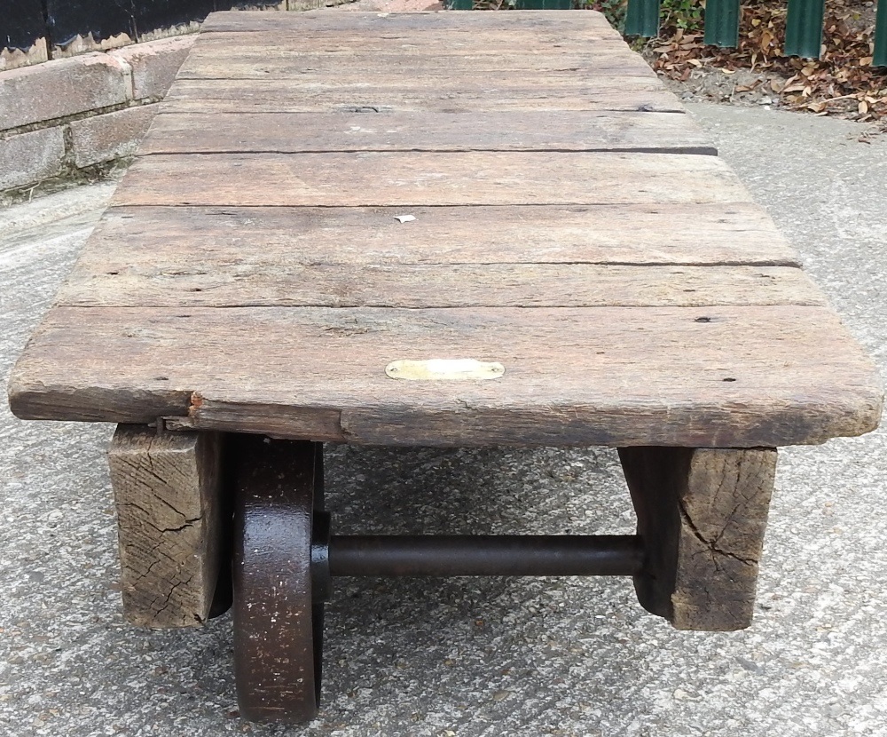 Lot 316 - A rustic wooden trolley