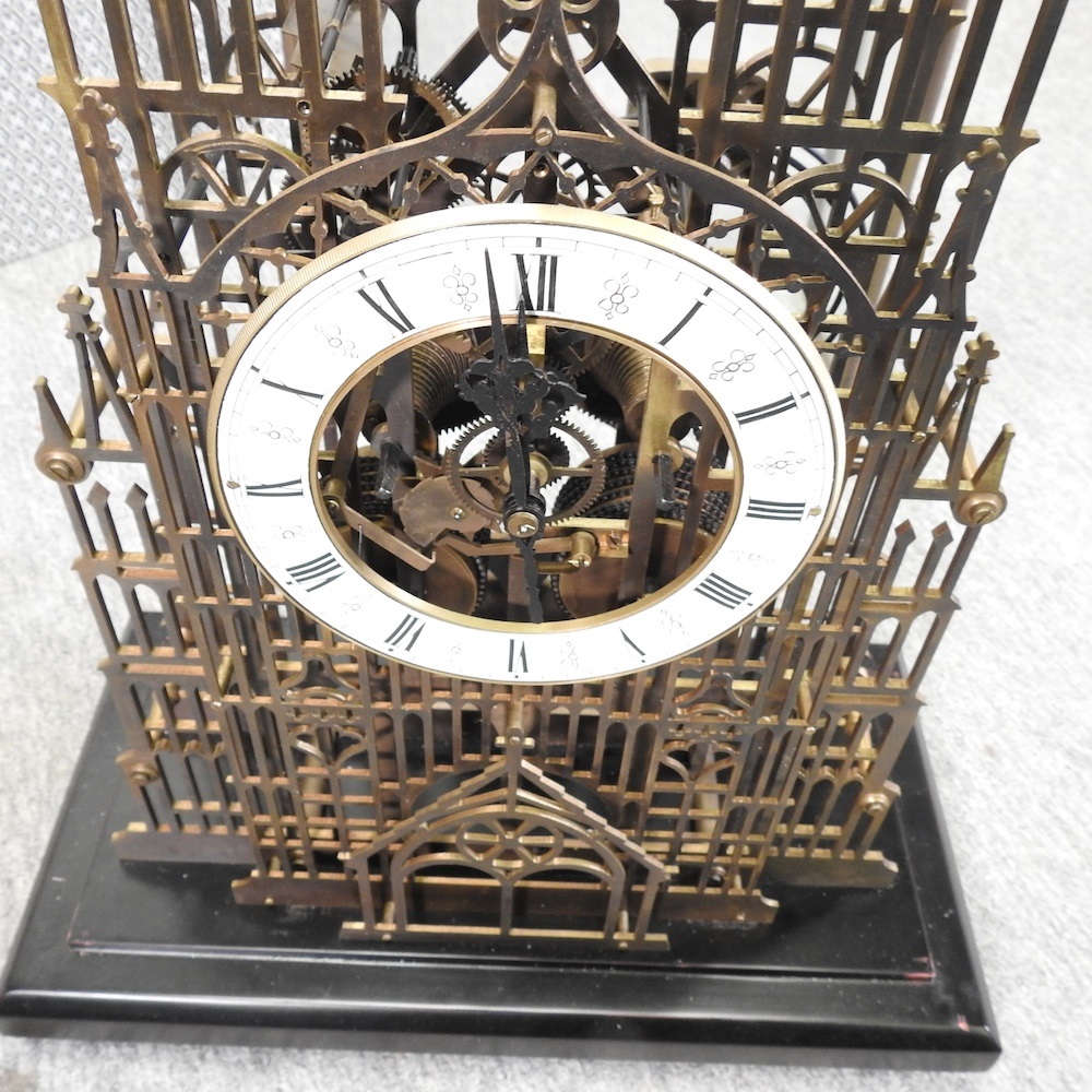 Lot 467 - A brass cathedral skeleton clock,