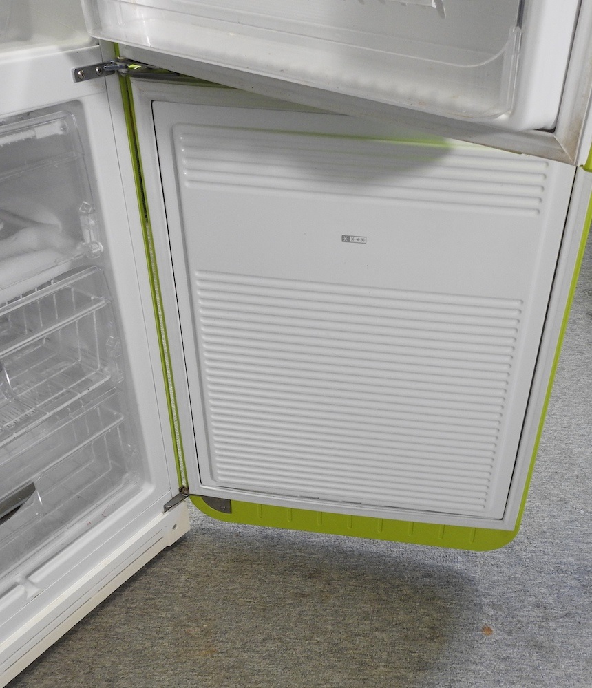 Lot 402 - A SMEG lime green fridge-freezer,