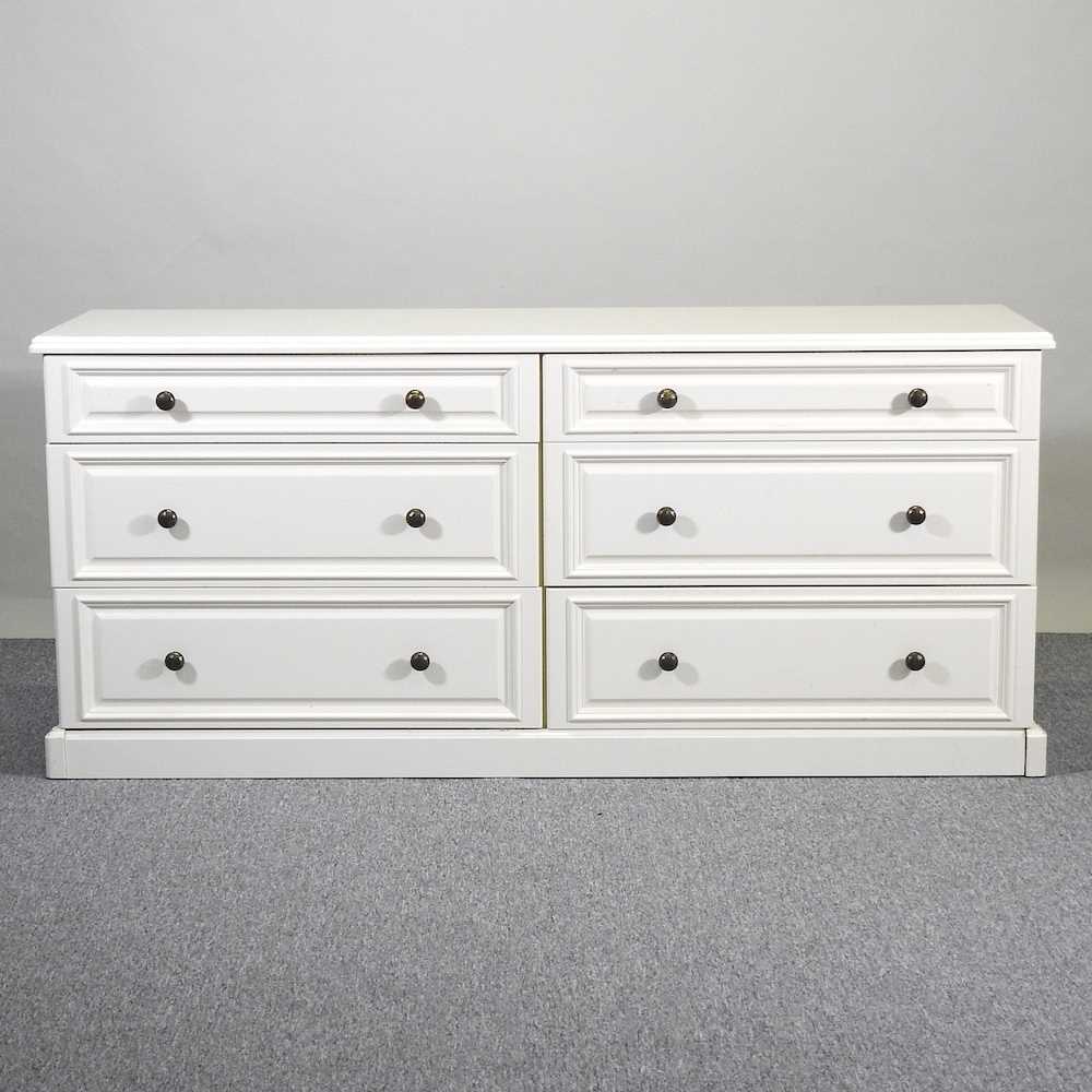 Lot 399 - A cream chest