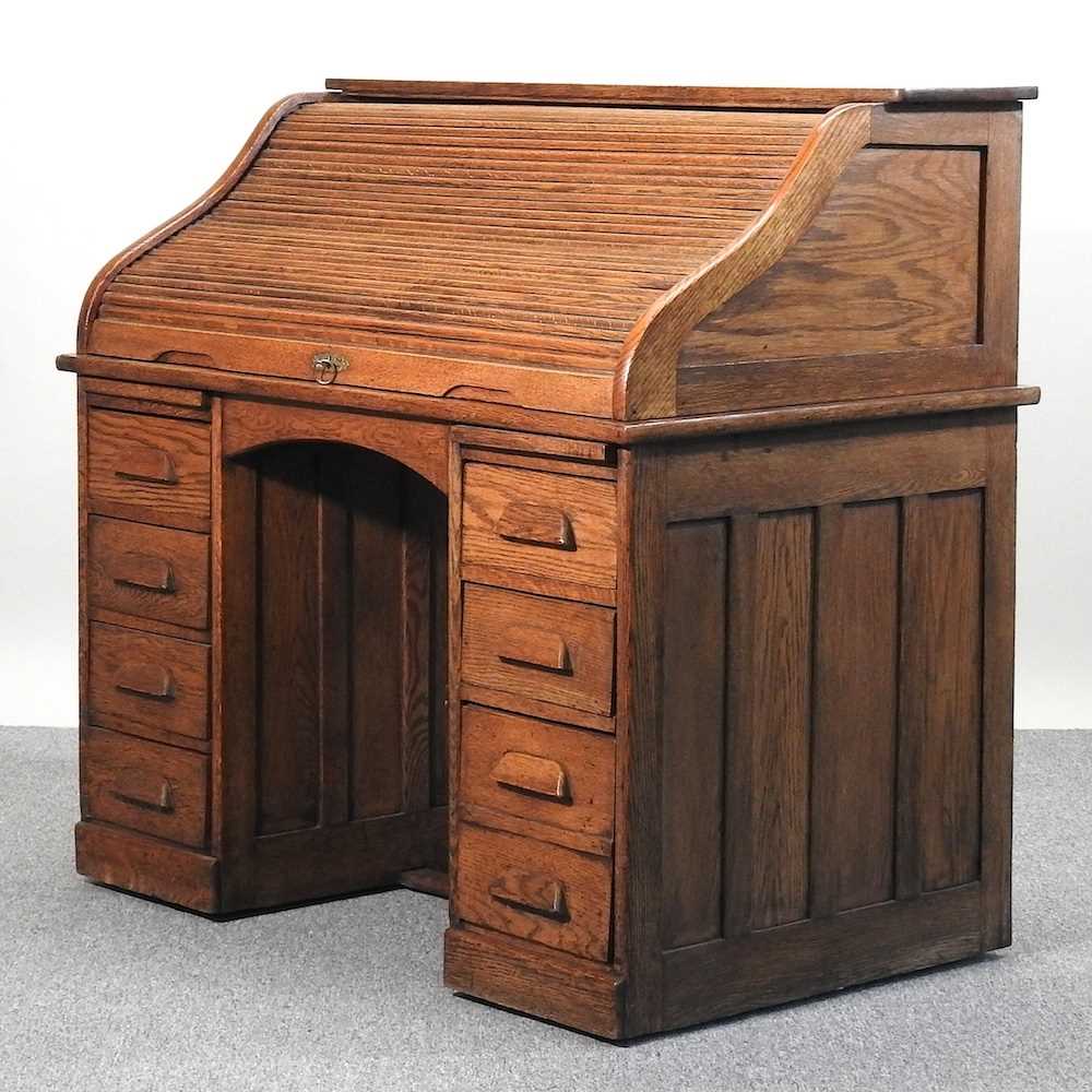 Lot 43 - A tambour desk
