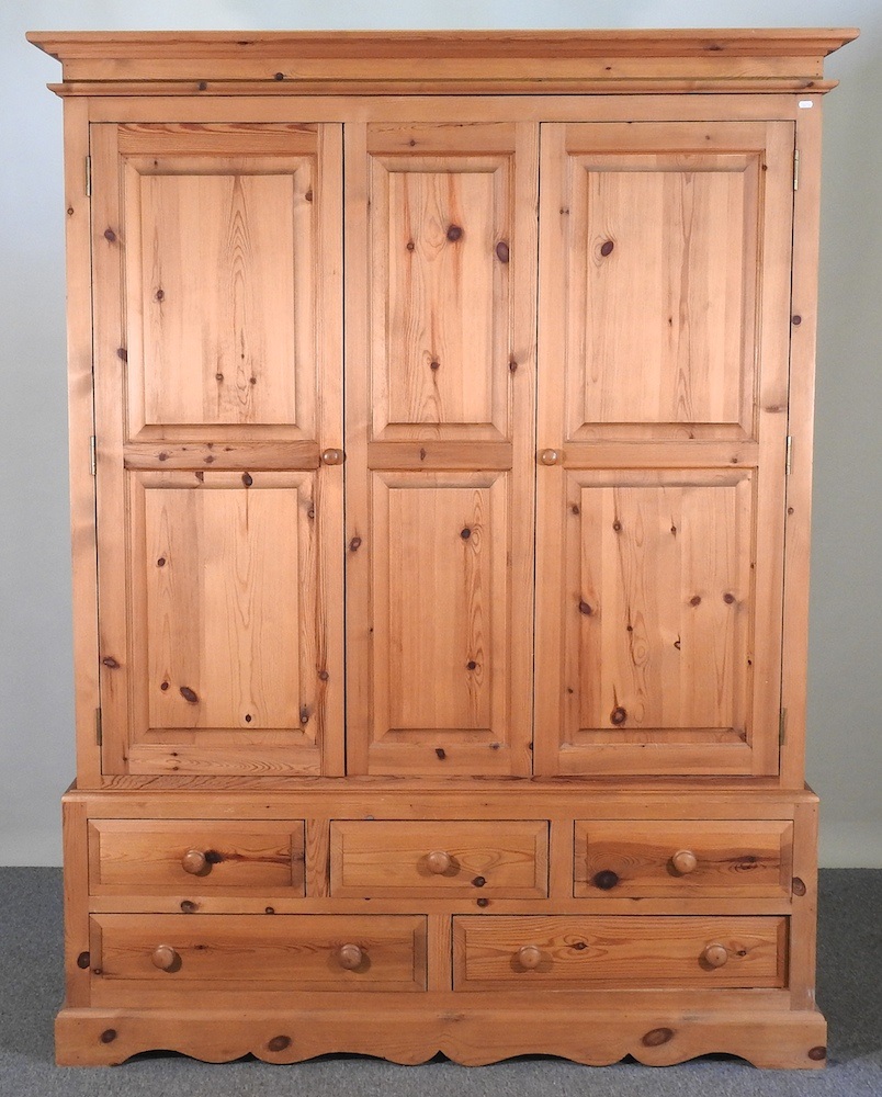 Lot 425 - A pine wardrobe