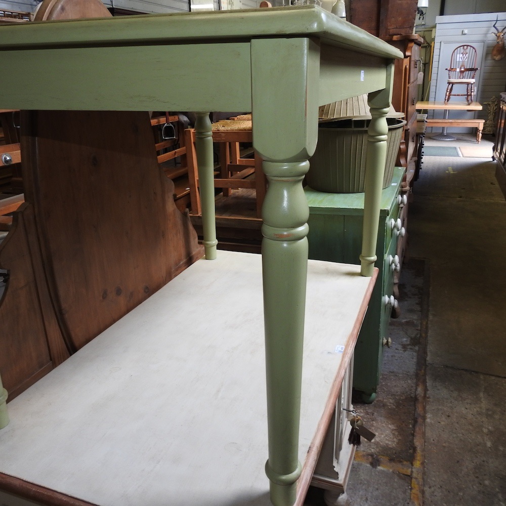 Lot 430 - A modern rustic green painted dining table