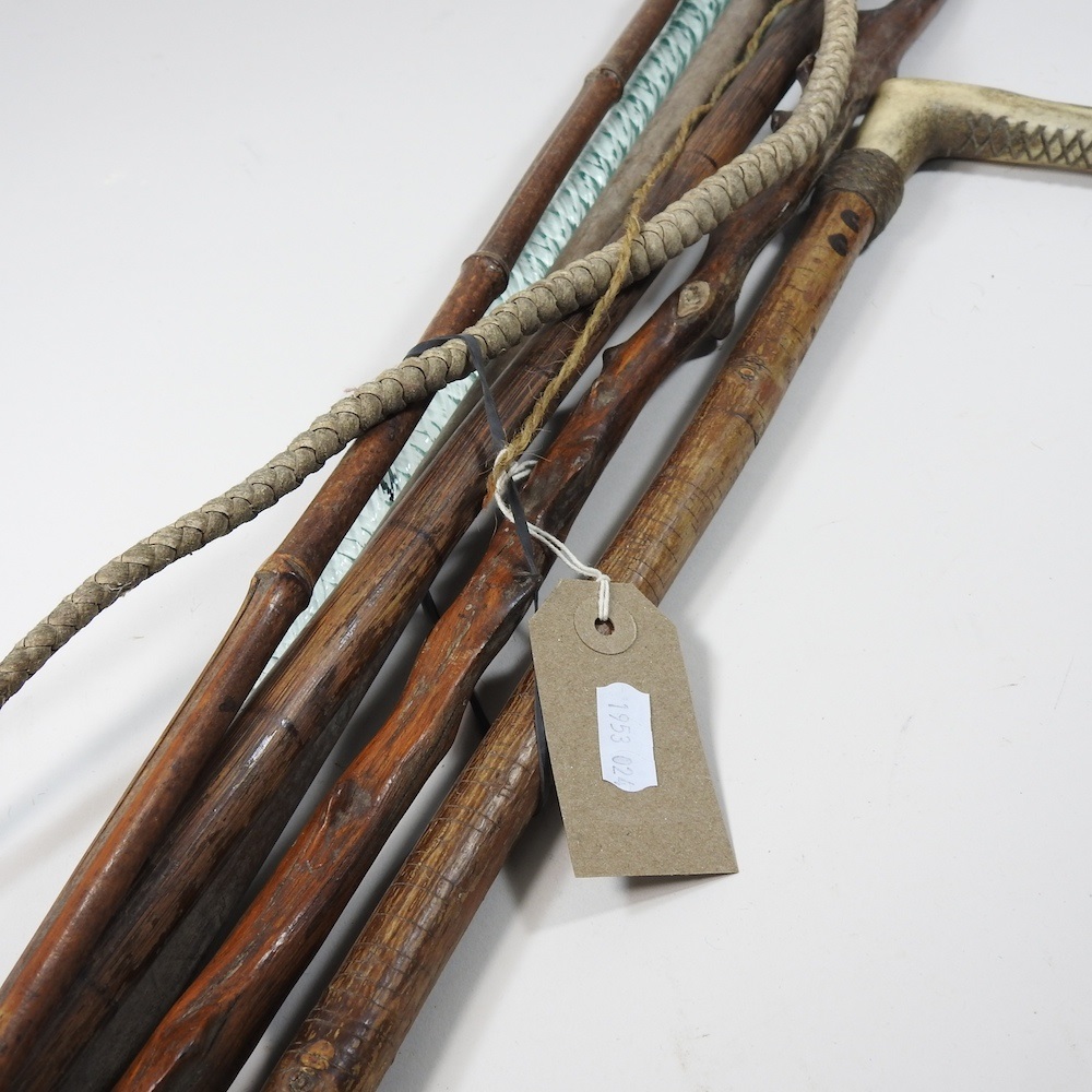 Lot 256 - A collection of riding crops