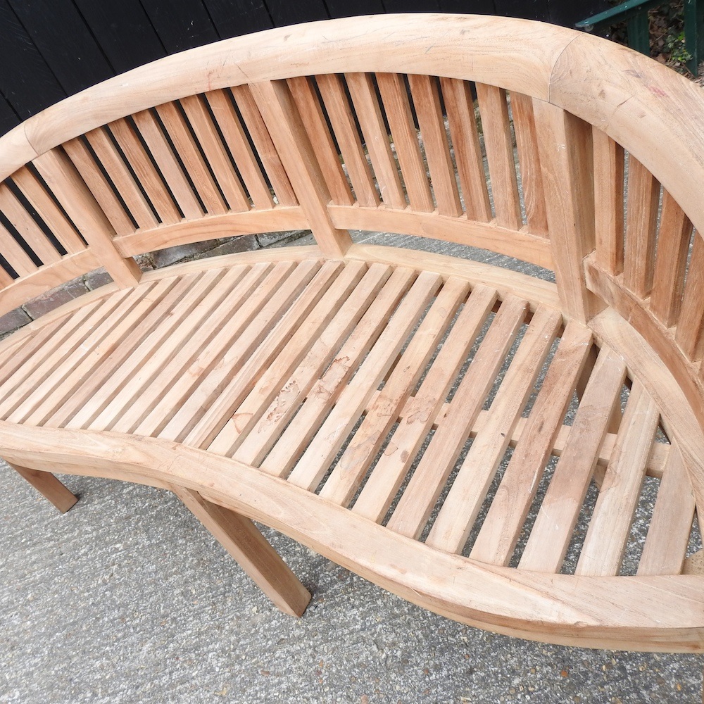 Lot 3 - A teak garden bench