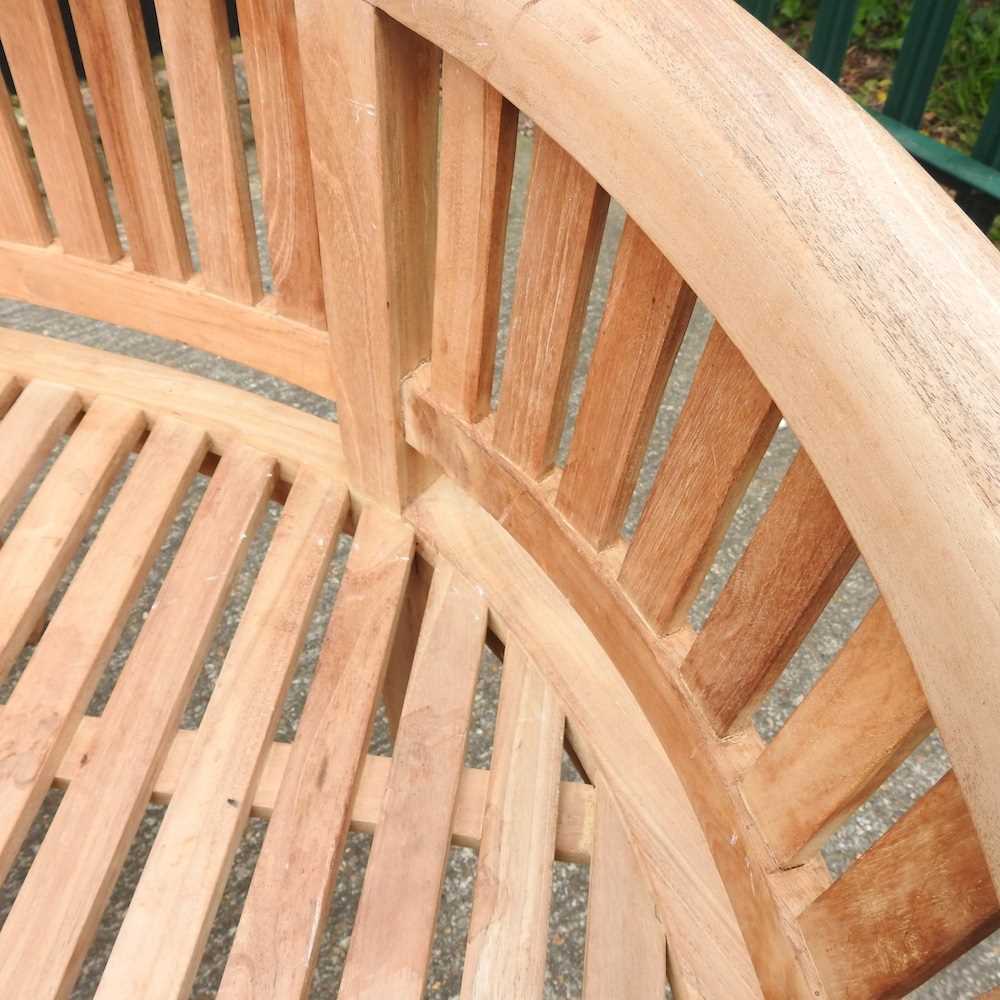 Lot 3 - A teak garden bench