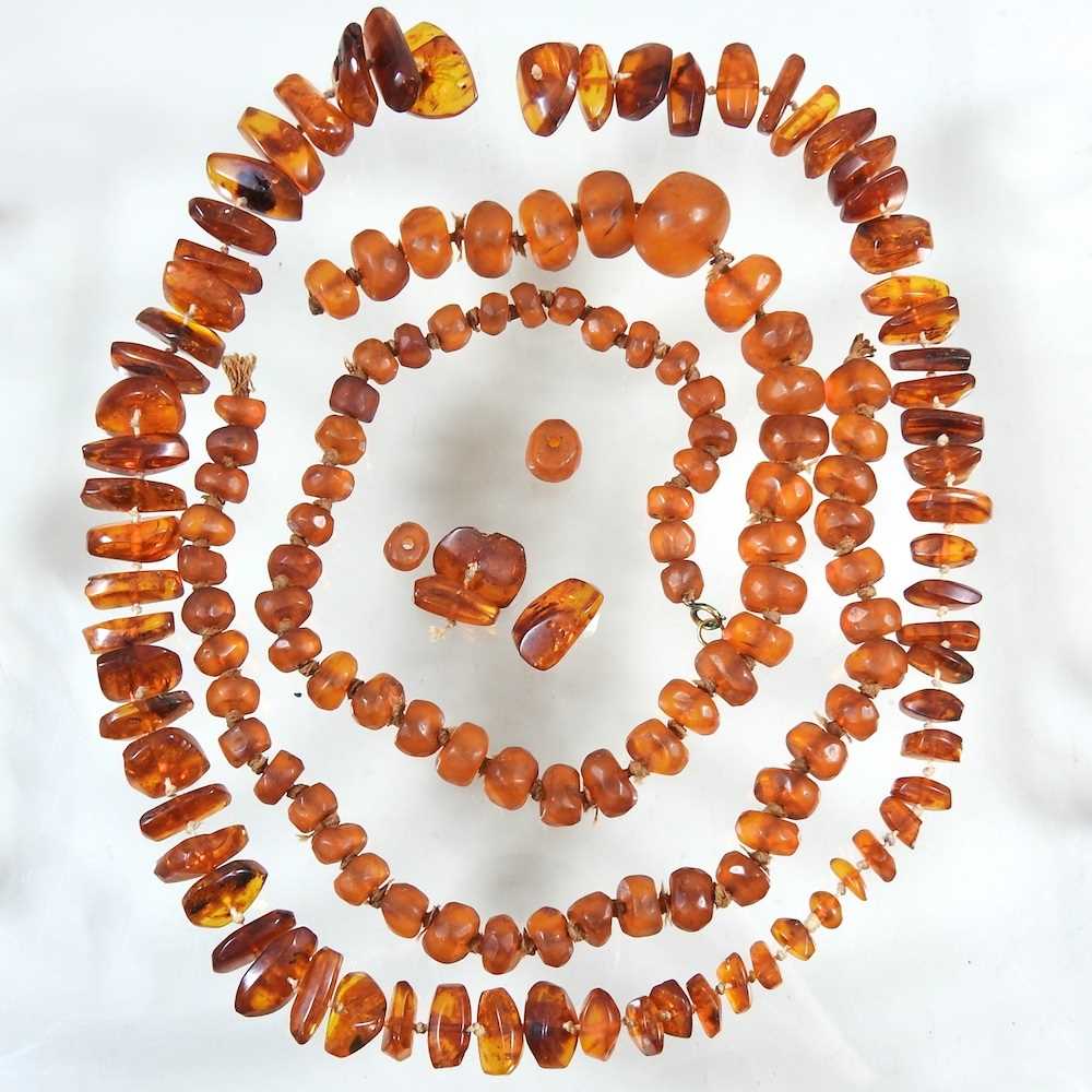Lot 328 - Two amber bead necklaces