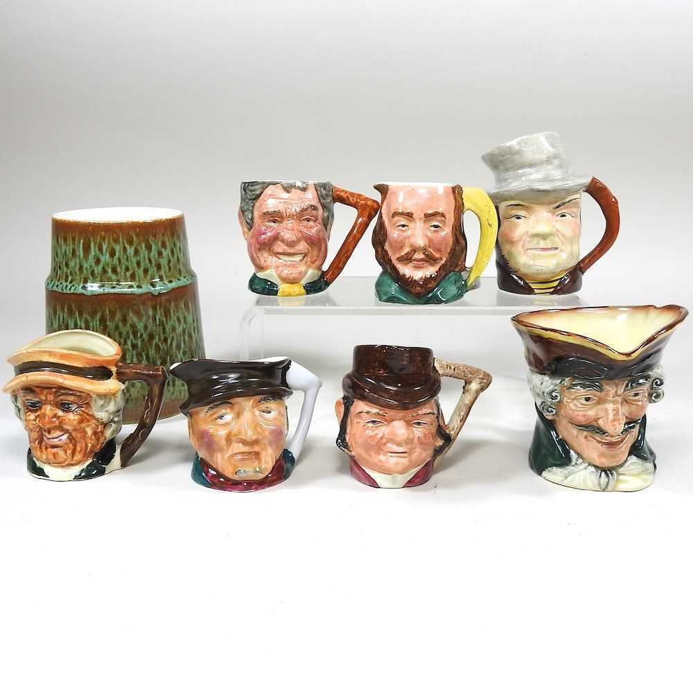 Lot 252 - A collection of Toby jugs