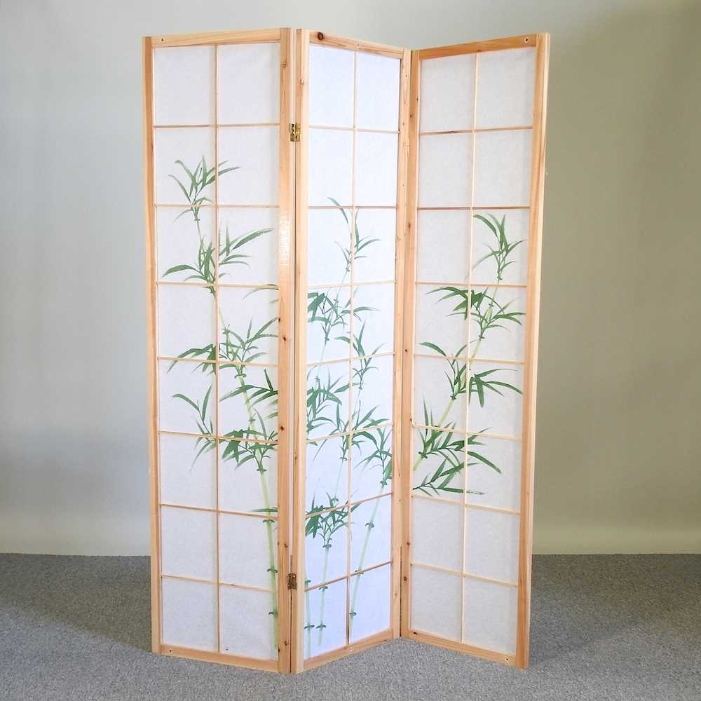 Lot 337 - An oriental dressing screen