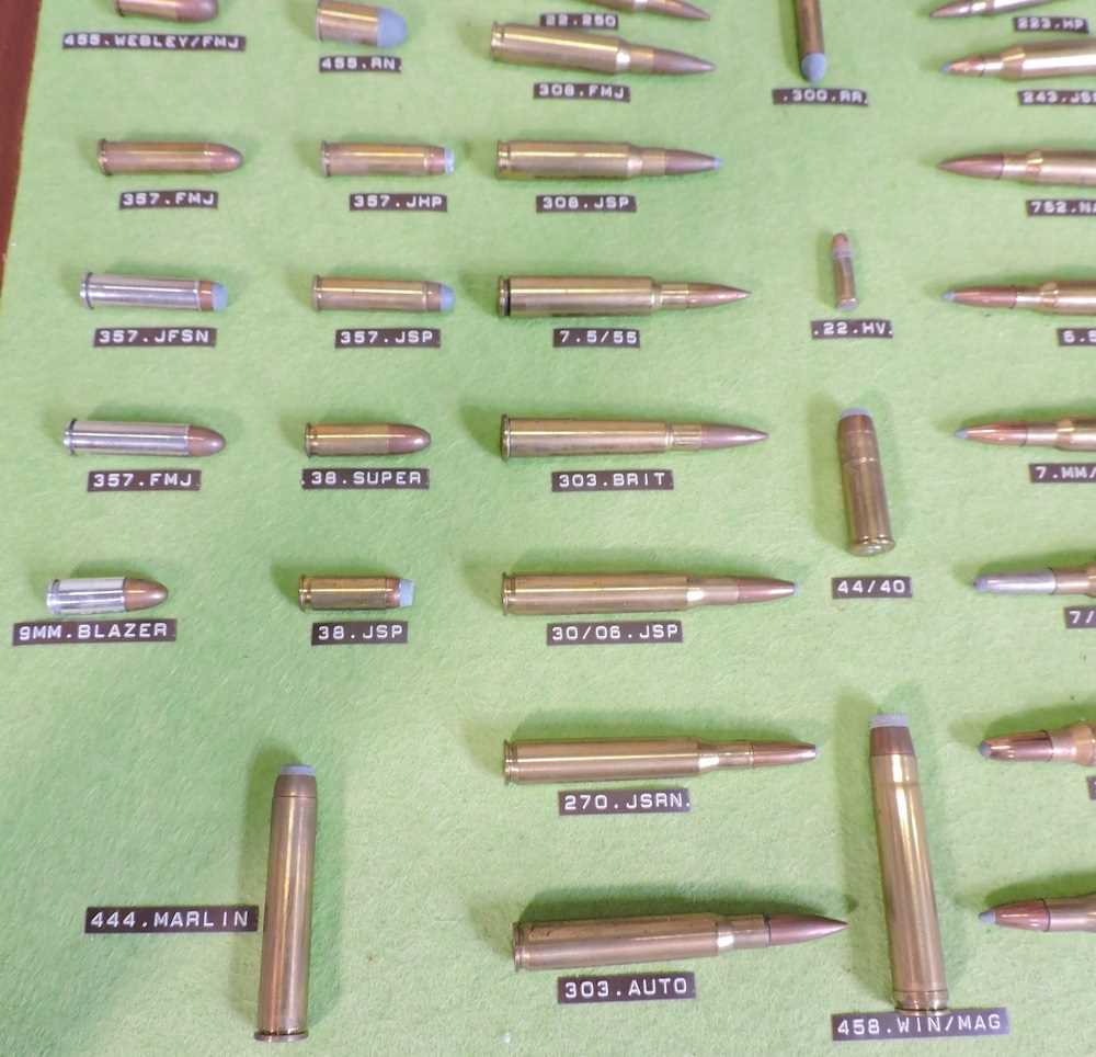 Lot 102 - A gun cartridge display case