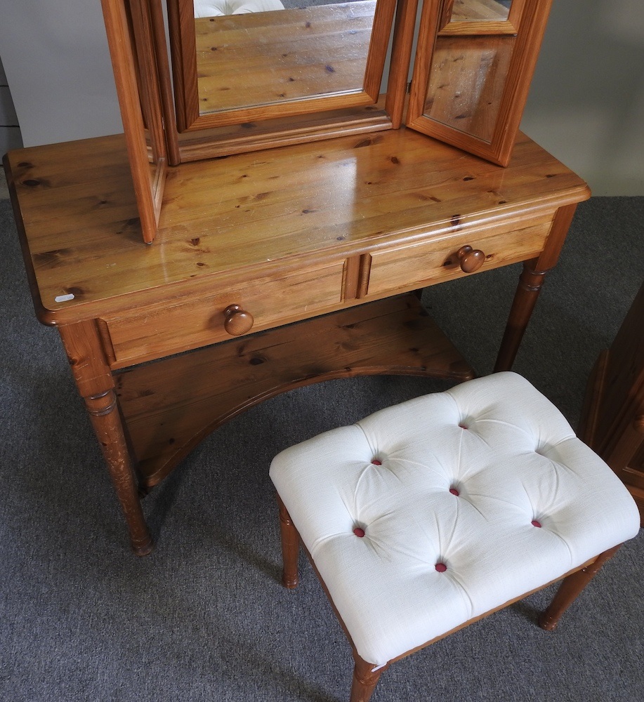 Lot 214 - A pine dressing table, stool and bedside