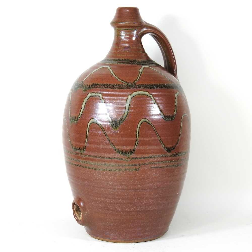 Lot 590 - Style of Bernard Leach, an Art pottery ewer,