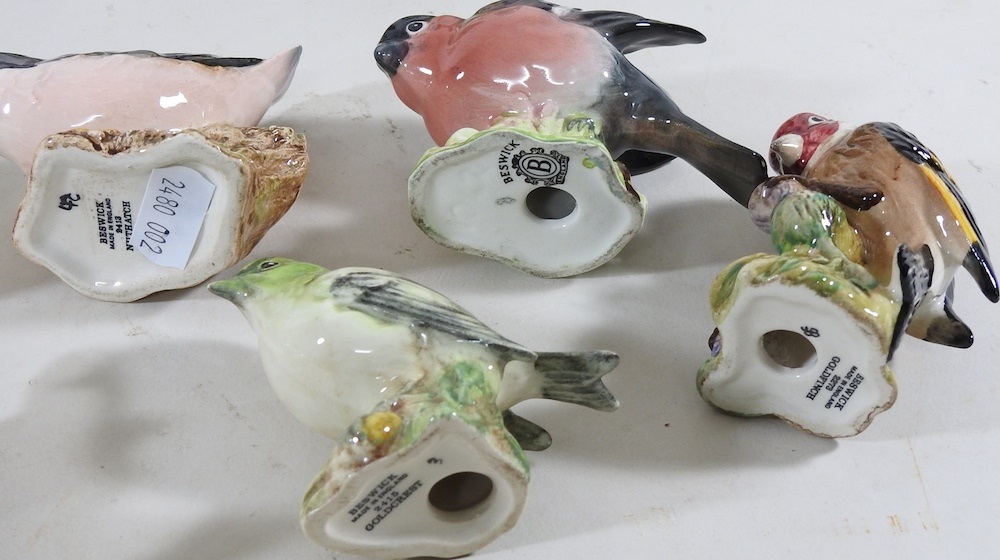 Lot 556 - A Beswick pottery model of an owl, 12cm high,