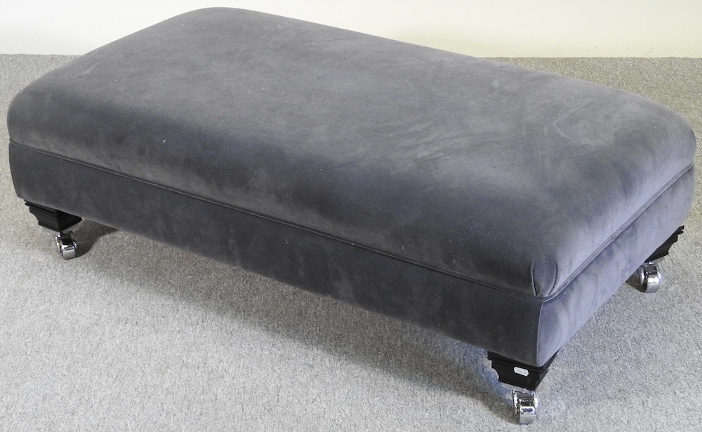 Lot 476 - A modern grey upholstered footstool, on