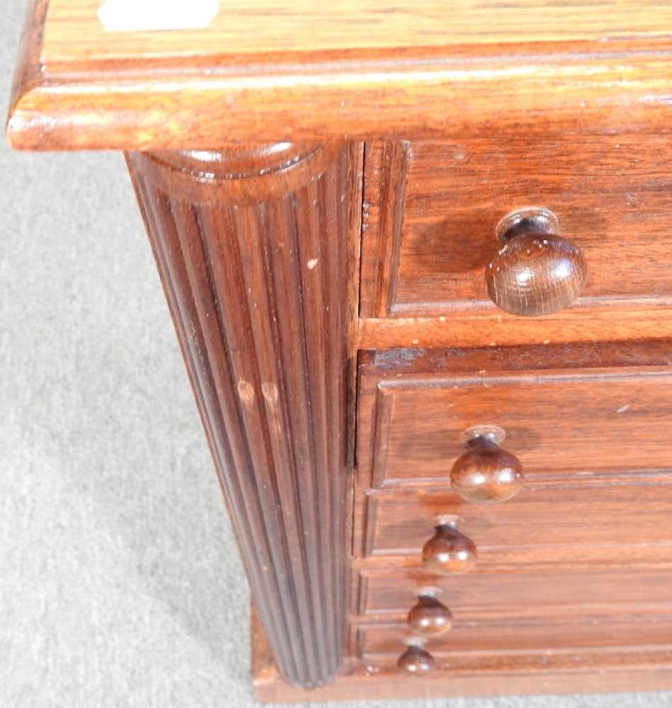 Lot 603 - A Victorian style narrow chest, on a plinth