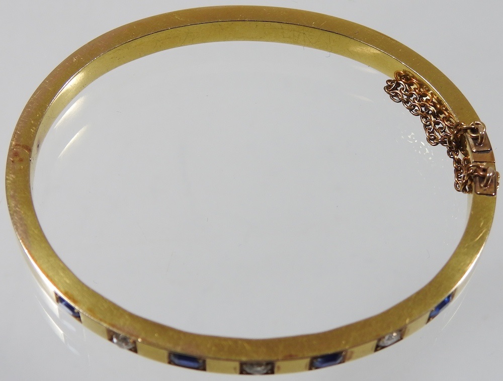 Lot 56 - An early 20th century 18 carat gold sapphire