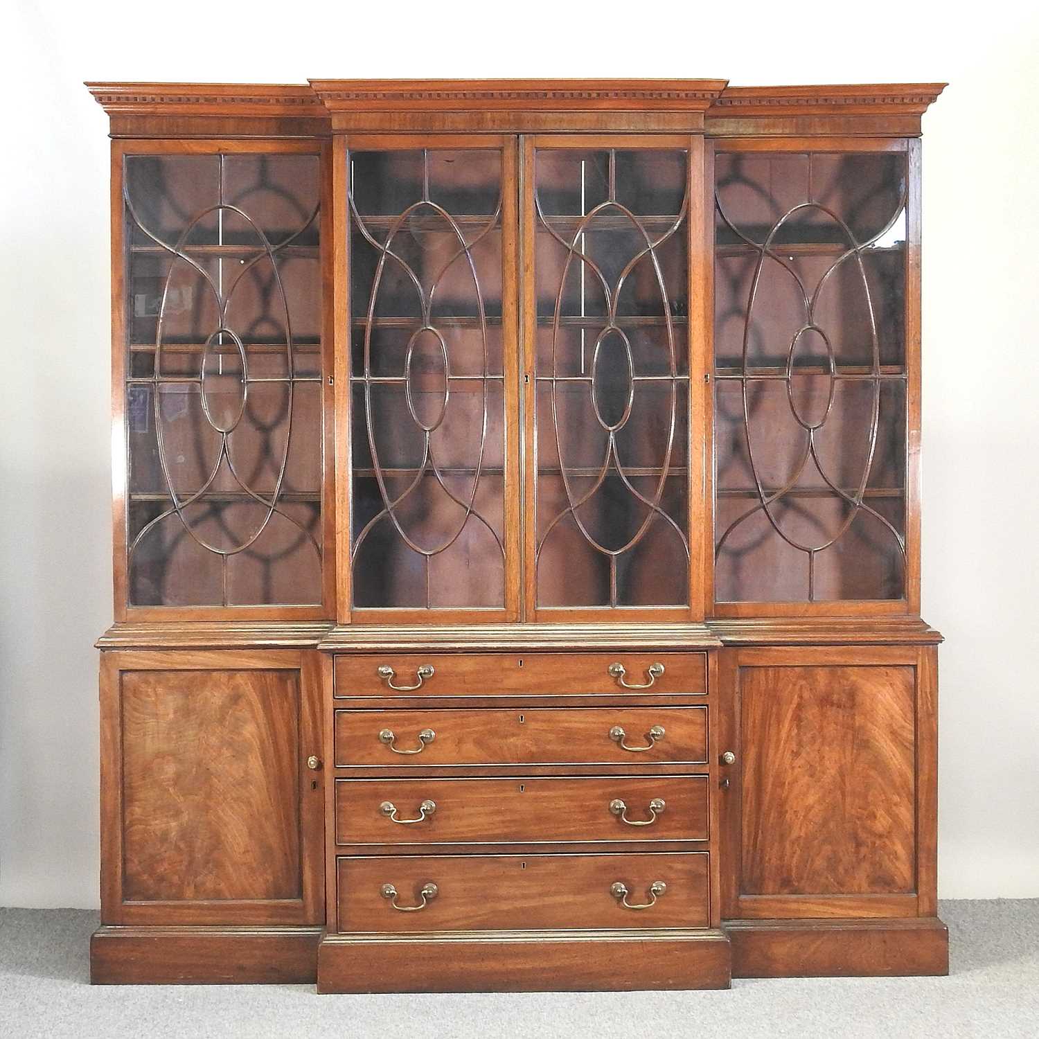 Lot 328 - An early 20th century mahogany breakfront