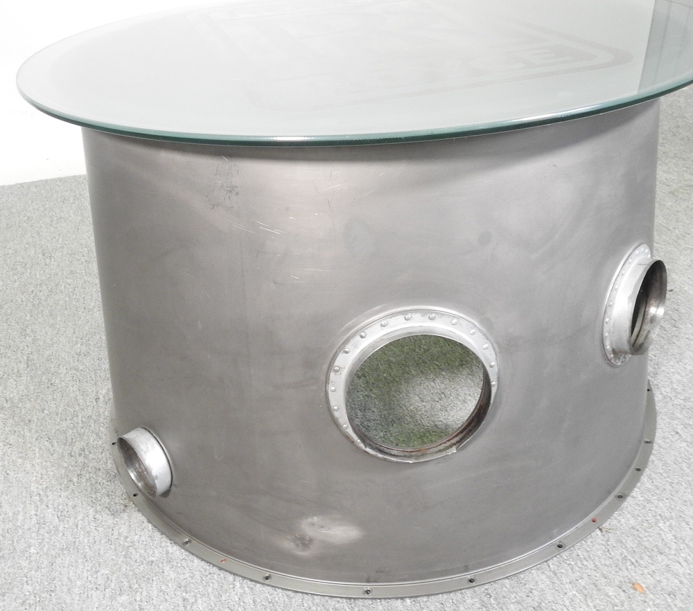 Lot 389 - A coffee table, made from the cowling of a