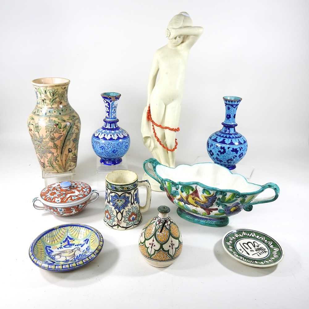 Lot 744 - An Indian tin glazed pottery vase, of bottle