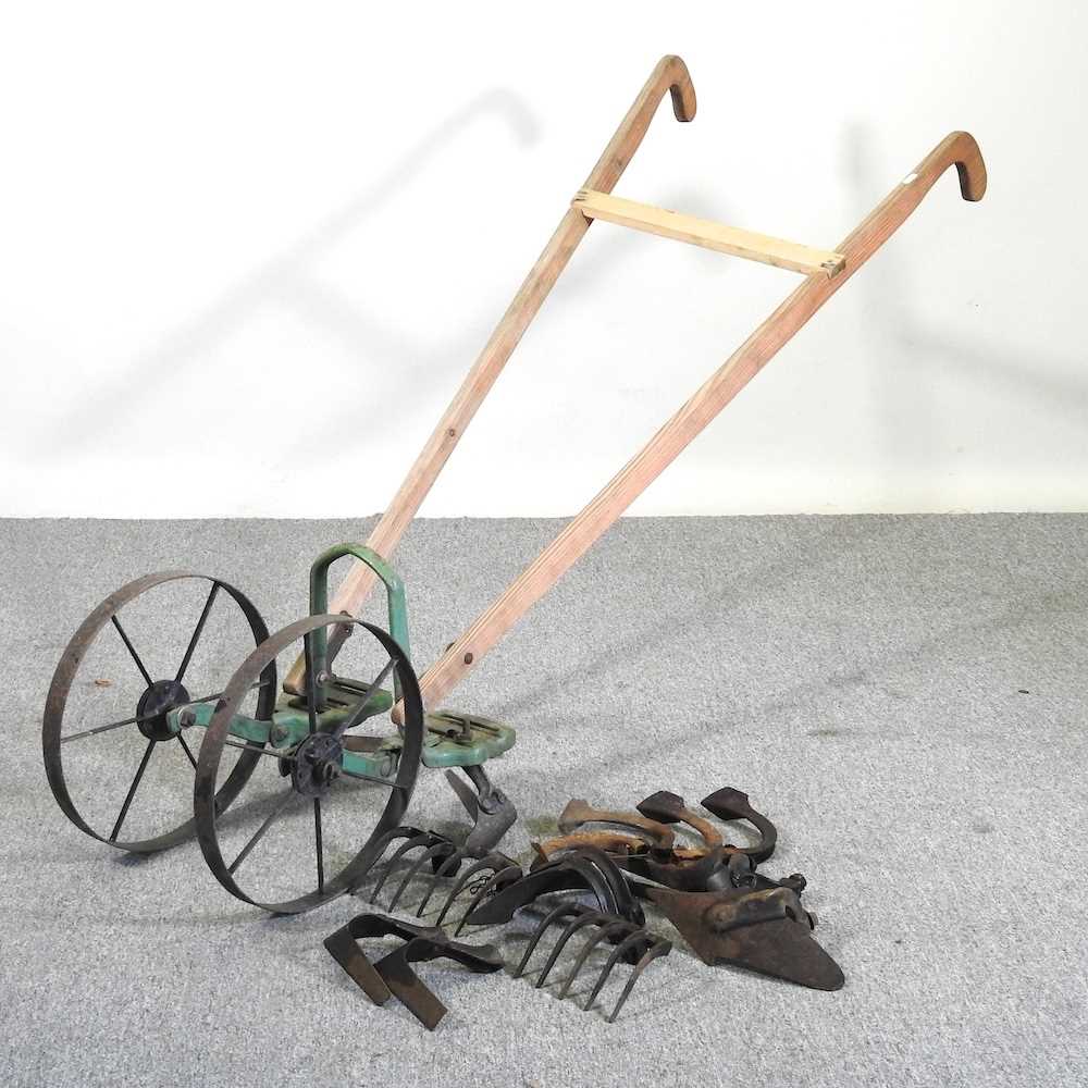 Lot 34 - A vintage farm hoe, stamped Planet JR, with