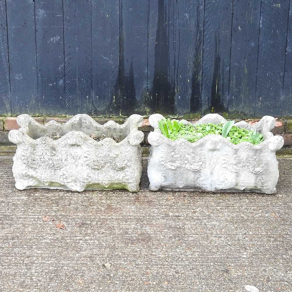 Lot 288 - A pair of cast stone garden troughs, with