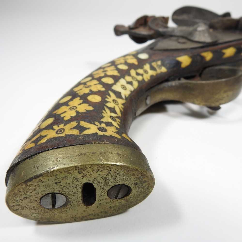 Lot 349 - A middle Eastern flintlock pistol, with bone