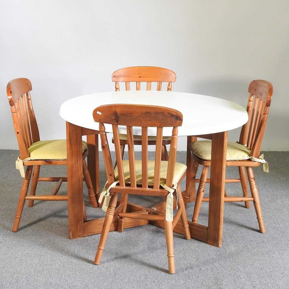 Lot 632 - A 1970's Formwood Ltd circular dining table,