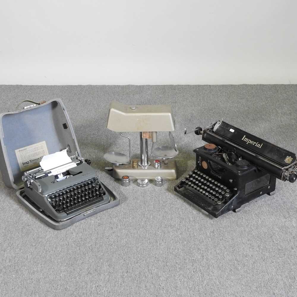 Lot 709 - A vintage Imperial typewriter, together with