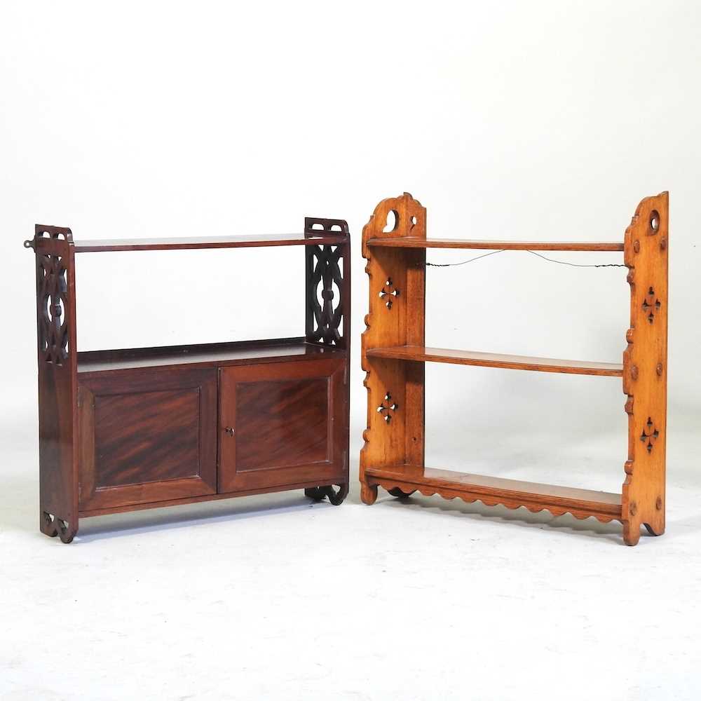 Lot 875 - An Edwardian mahogany hanging shelf, 56cm
