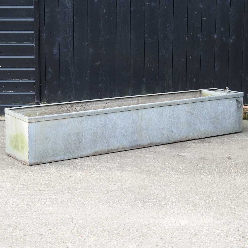 Lot 532 - A large galvanised garden trough