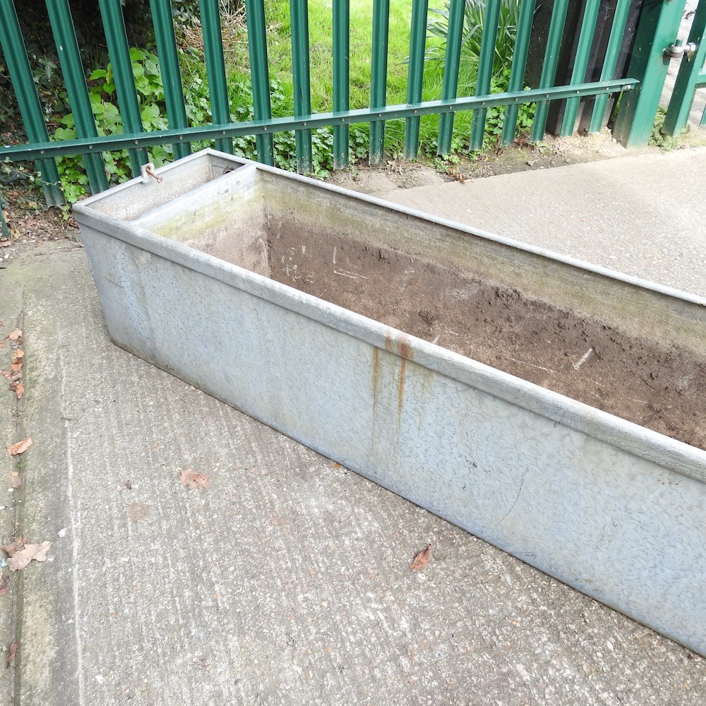 Lot 532 - A large galvanised garden trough
