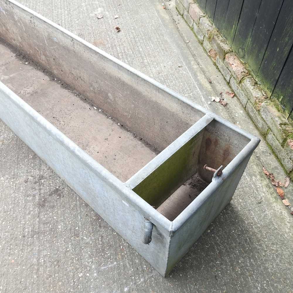 Lot 532 - A large galvanised garden trough