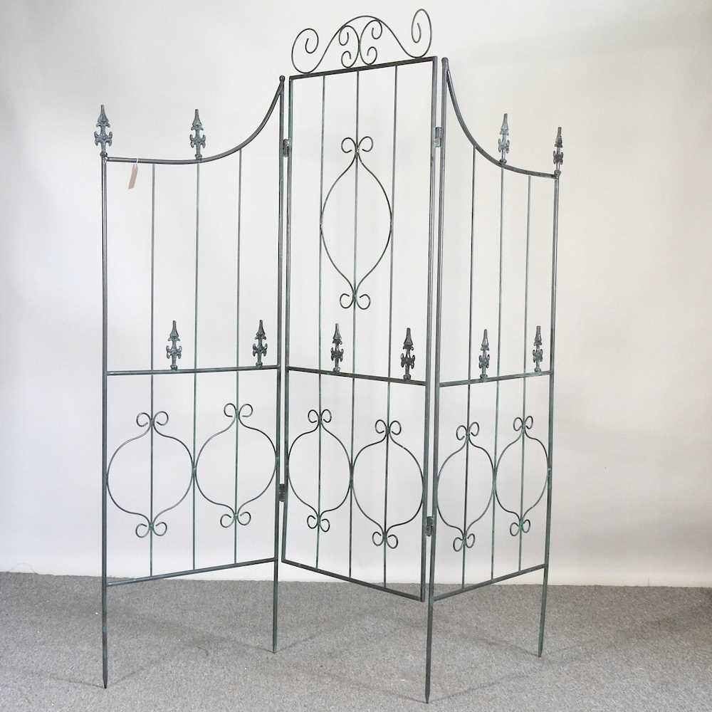 Lot 95 - A three panel metal folding garden screen