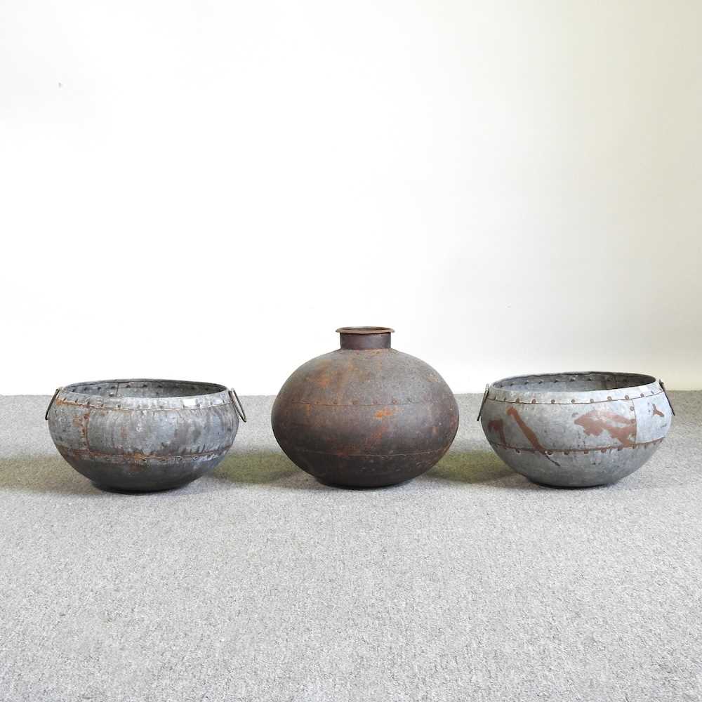 Lot 106 - A handi half-round metal pot, 35cm wide,