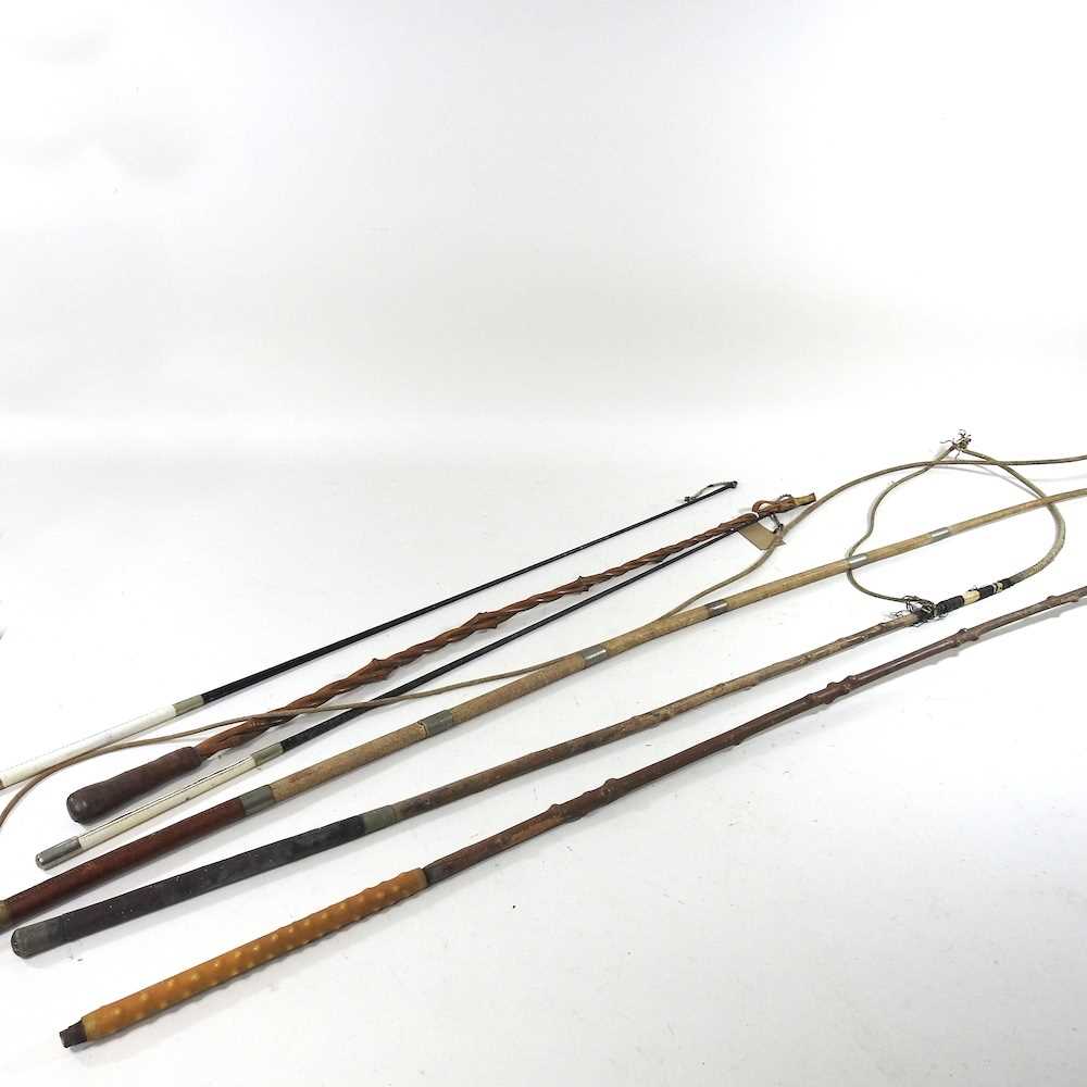 Lot 643 - A collection of various riding whips