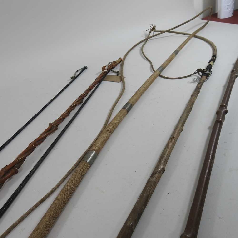 Lot 643 - A collection of various riding whips