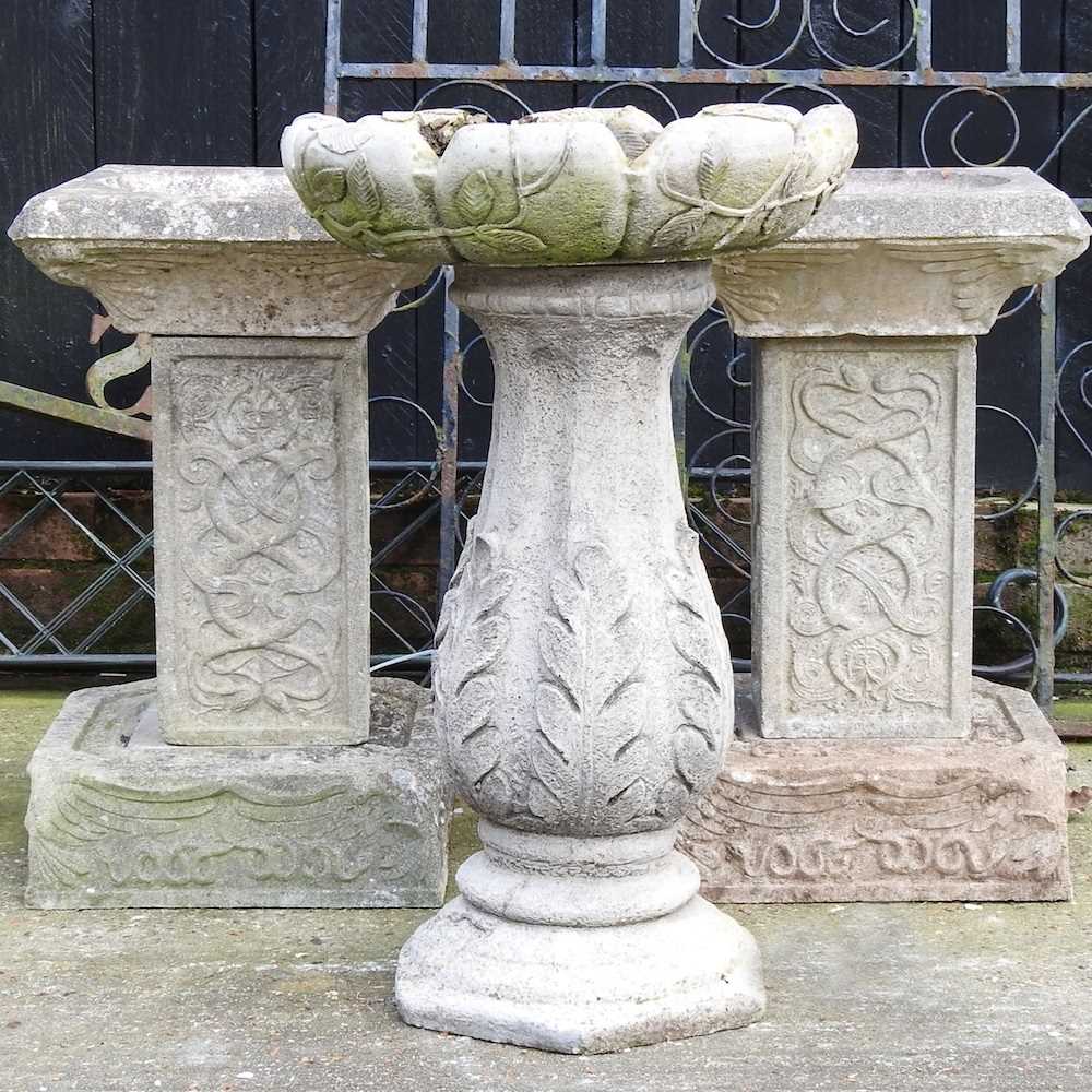 Lot 158 - A pair of cast stone bird baths, 54cm high,
