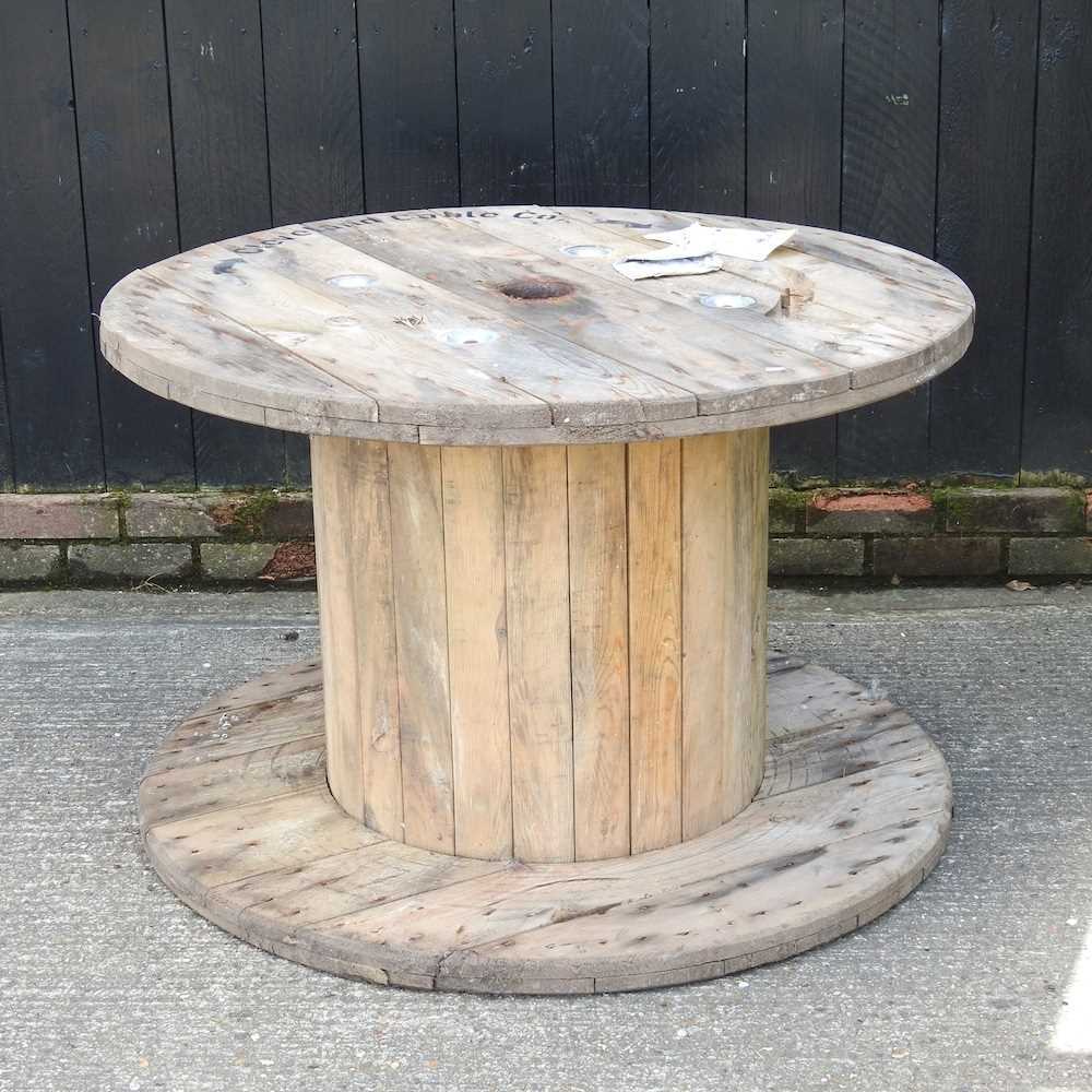 Lot 462 - A wooden cable reel garden table