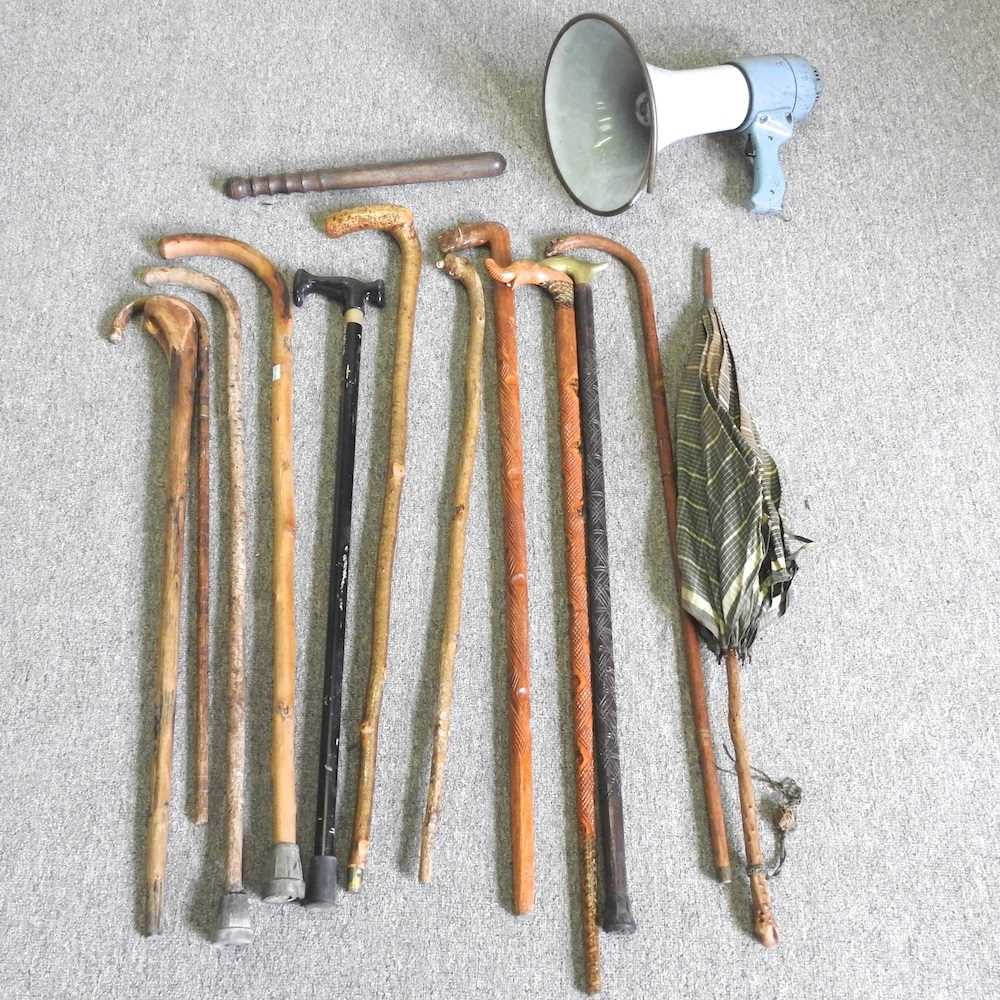 Lot 92 - A collection of walking sticks, together with