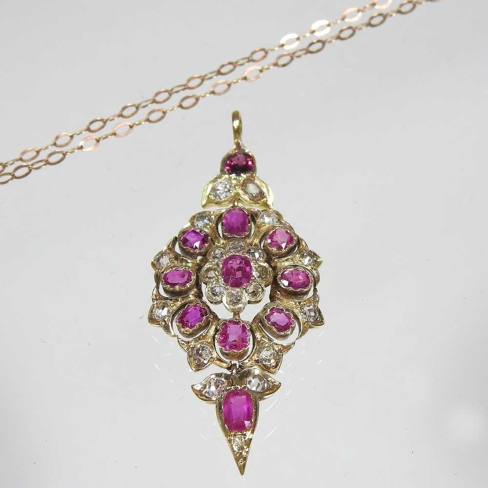 Lot 144 - A 19th century diamond and ruby pendant, of