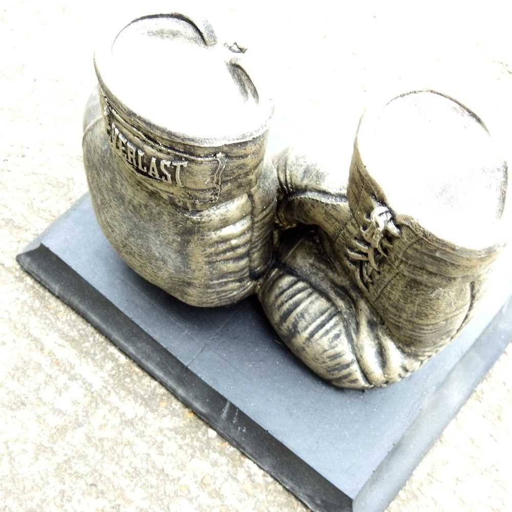 Lot 170 - A cast stone garden sculpture of boxing