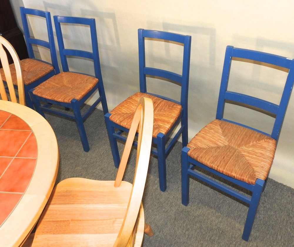 Lot 461 - A tile top beech extending dining table
