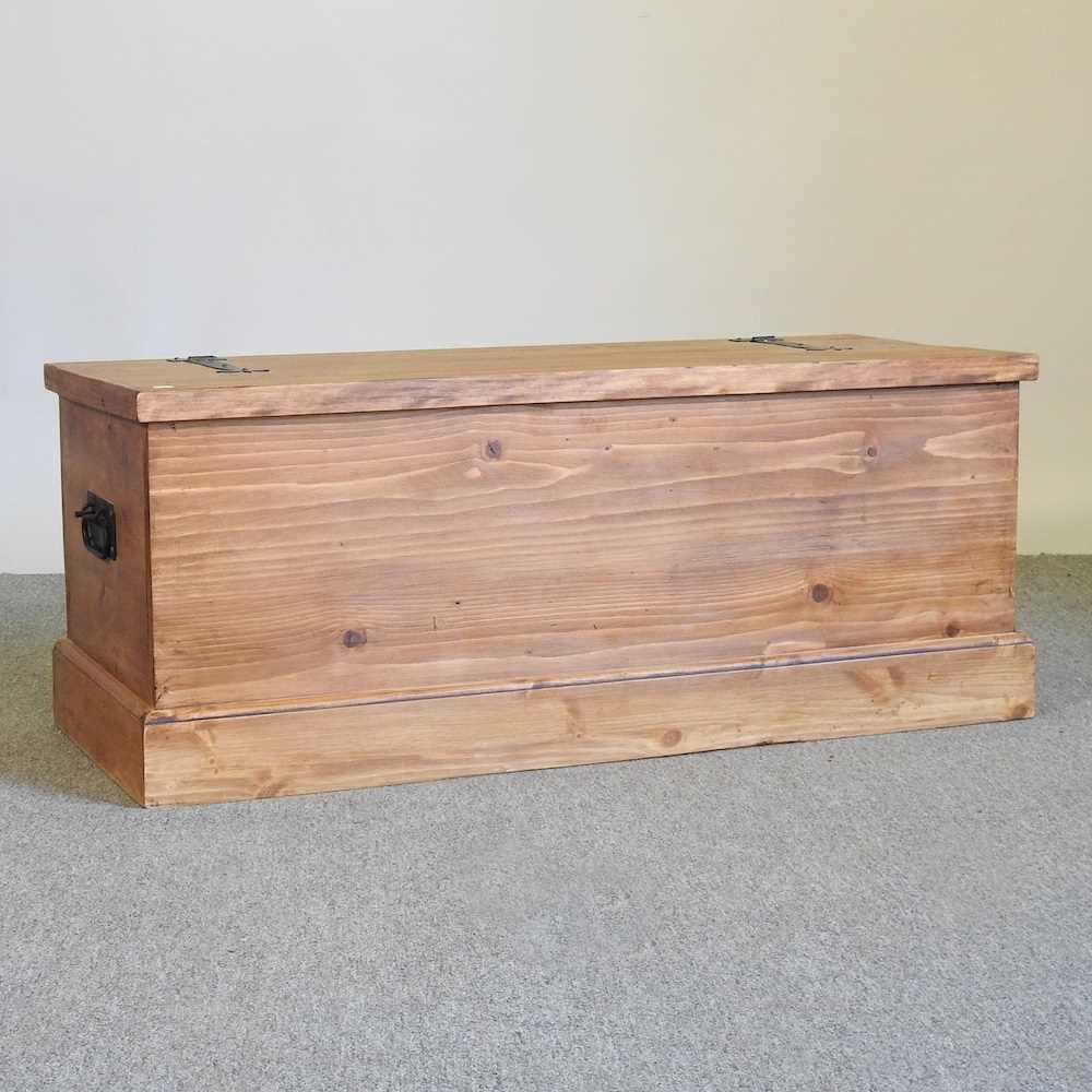 Lot 184 - A hand made pine blanket box, with a hinged