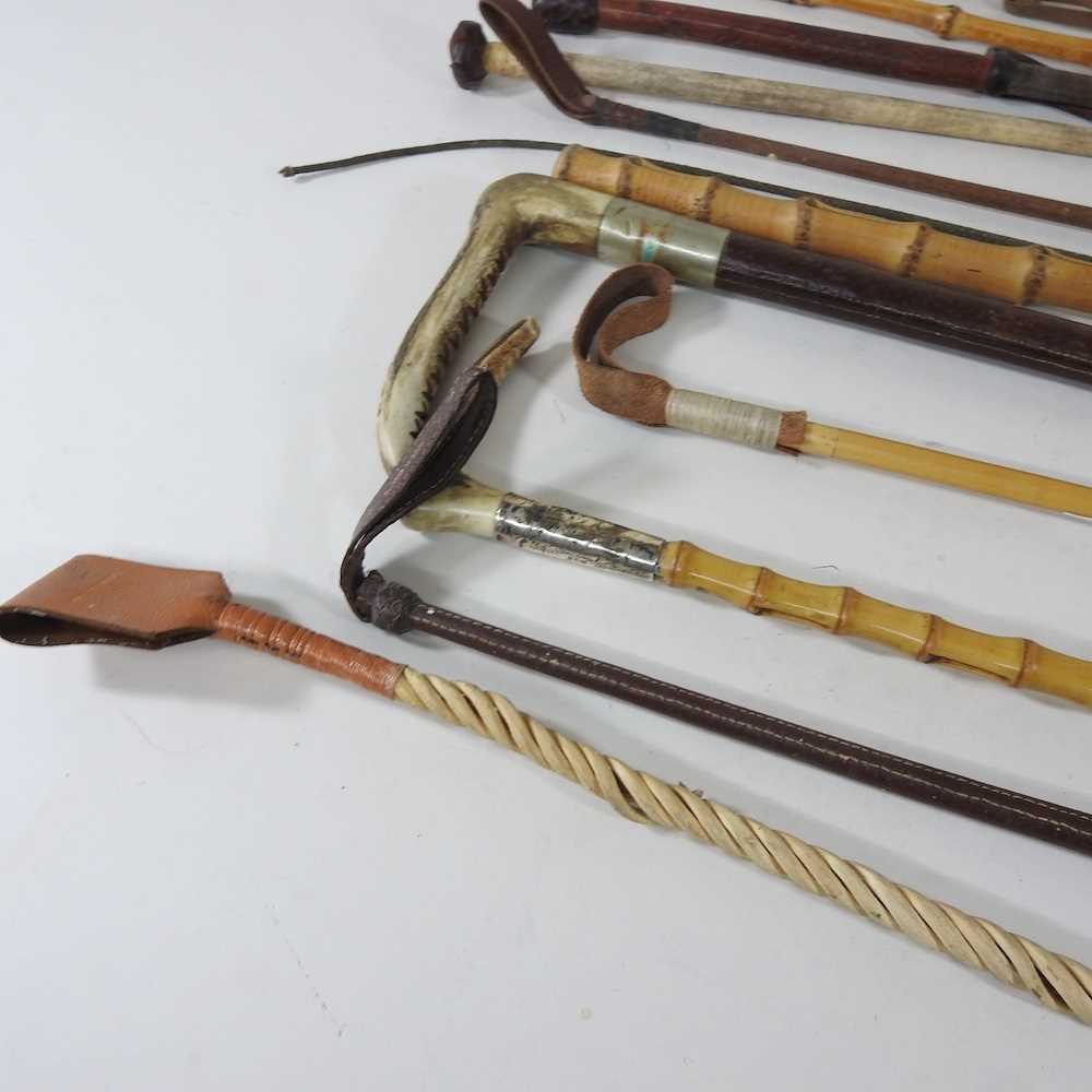 Lot 286 - A collection of riding crops and horse whips