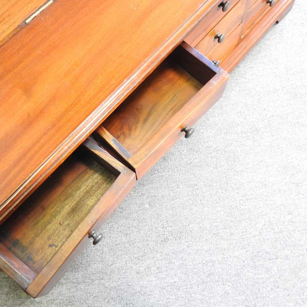 Lot 374 - A modern hardwood coffee table, 118cm wide,