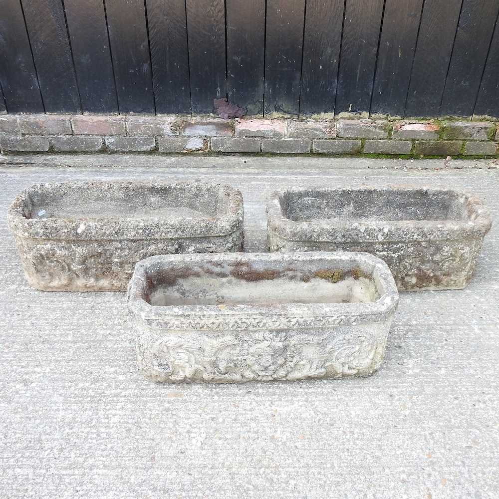Lot 416 - A pair of cast stone garden troughs,